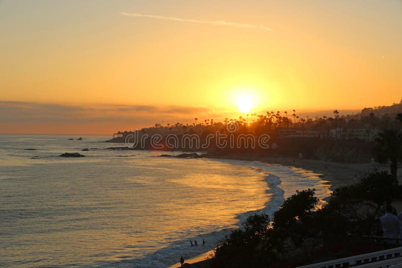 Sunset over Laguna Beach stock image. Image of palm, beach - 56049875