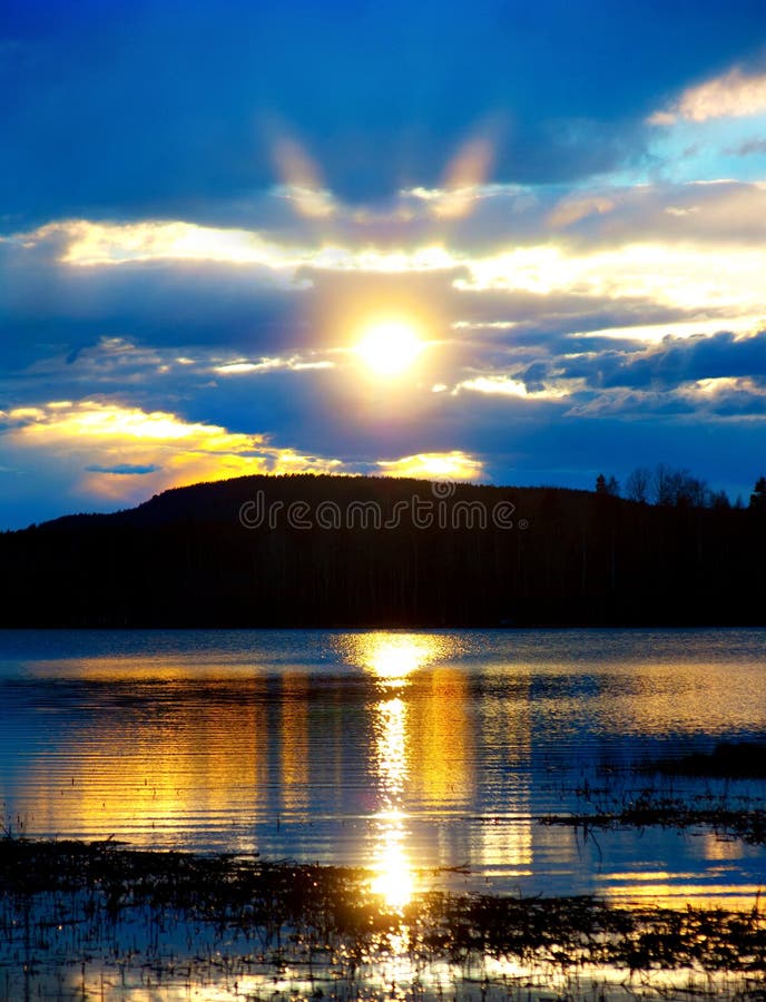 Sunset over lake stock image. Image of sunset, lake, night - 26351095
