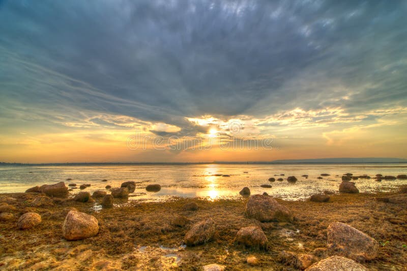 Sunset Over the Lake with Many Stones Stock Image - Image of horizont ...
