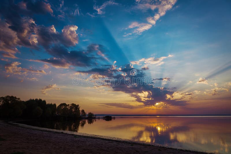 Sunset over the lake stock image. Image of calm, countryside - 73268389