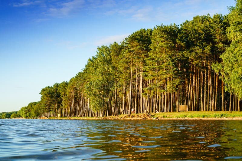 Sunset Over Landscape with Beautiful Green Forest and Lake in Th Stock ...