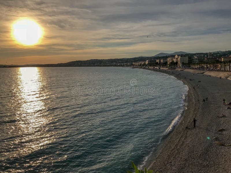 Sunset Over the Mediterranean - the Beach at Nice, France Stock Photo ...