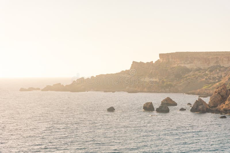 Sunset Over the Misty Cliffs of Golden Bay , Malta Stock Image - Image ...