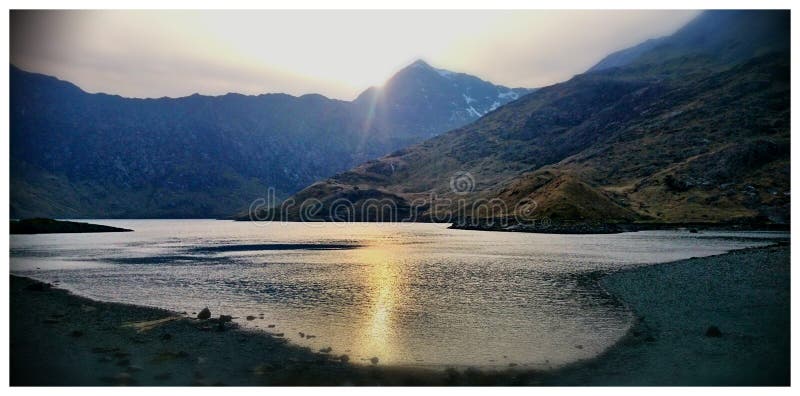 Sunset over mount snowdon stock image. Image of reflecting - 56242761