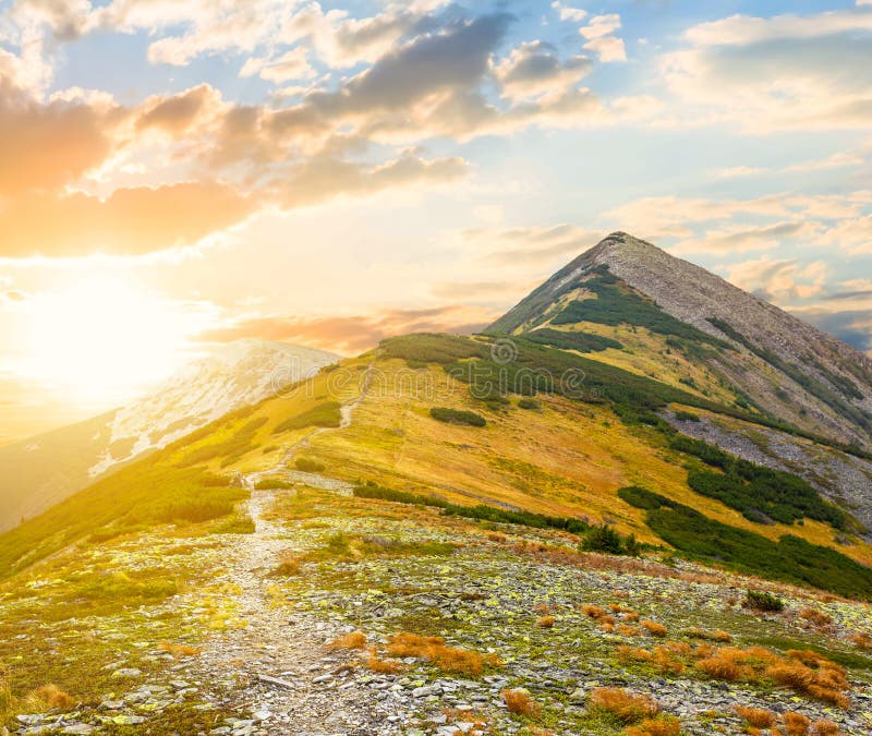 Sunset Over a Mountain Chain Stock Photo - Image of slope, morning ...