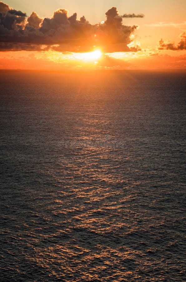 Sunset over Ocean stock image. Image of outdoors, cloudy - 92559243