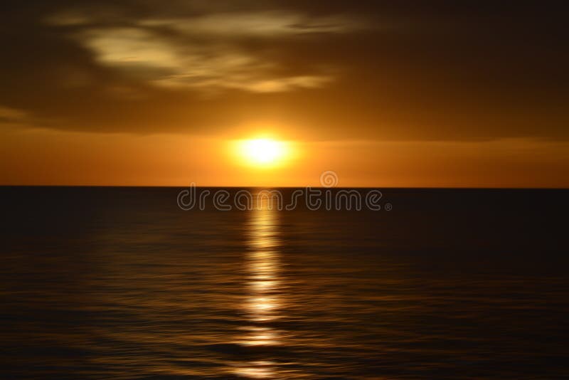 Sunset Over the Ocean. Blurry Abstract Art Background in Digital Motion ...