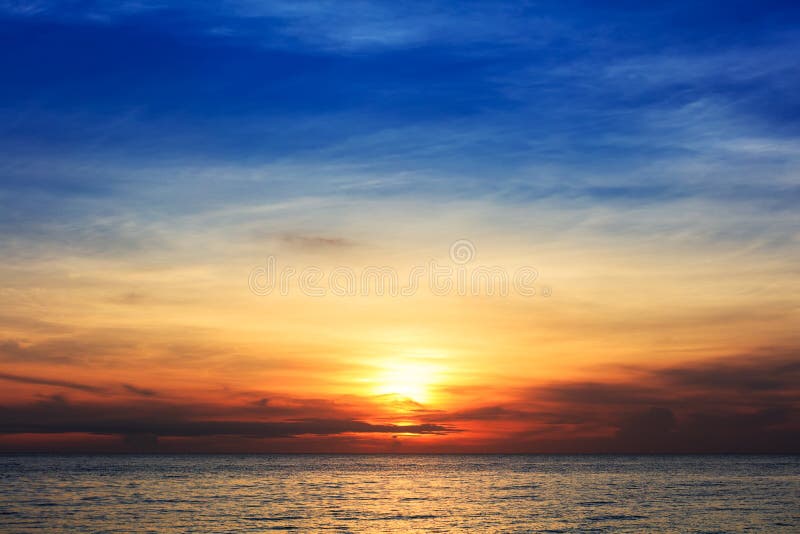 Sunset Over the Ocean on Clear Day Stock Photo - Image of sunset ...