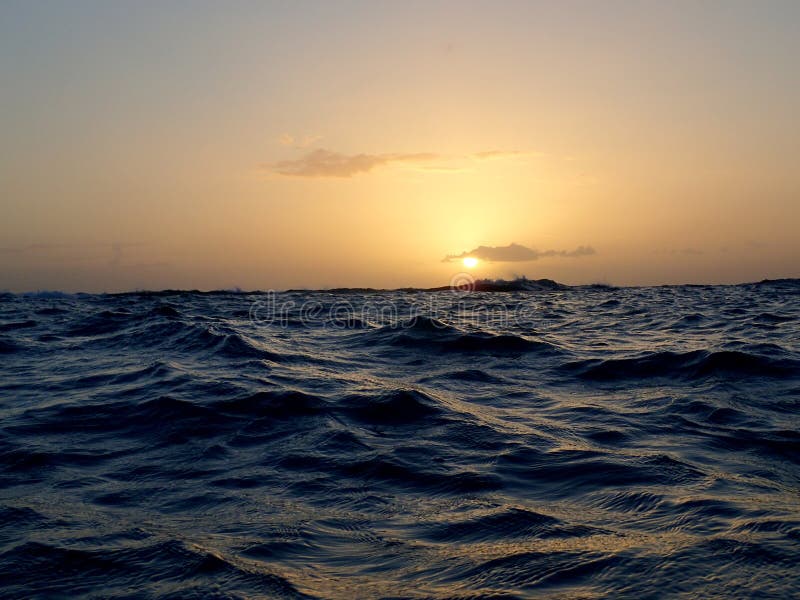 Sunset Over Ocean through the Clouds Stock Photo - Image of soft ...