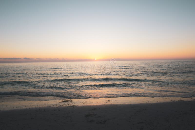 Sunset Over the Ocean in Florida Stock Photo - Image of florida, sand ...