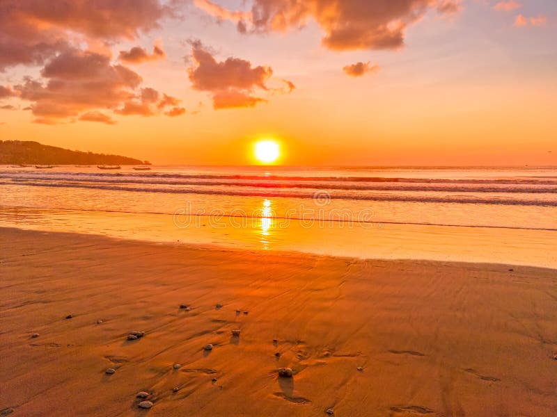 Sunset Over the Ocean in Jimbaran Beach, Bali Stock Image - Image of ...