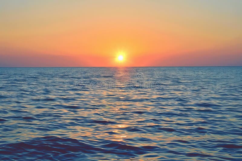 Sunset Over the Ocean with Visible Sun on Horizon. Stock Image - Image ...