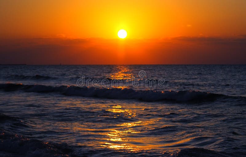 Sunset over ocean waves stock photo. Image of evening - 25840770