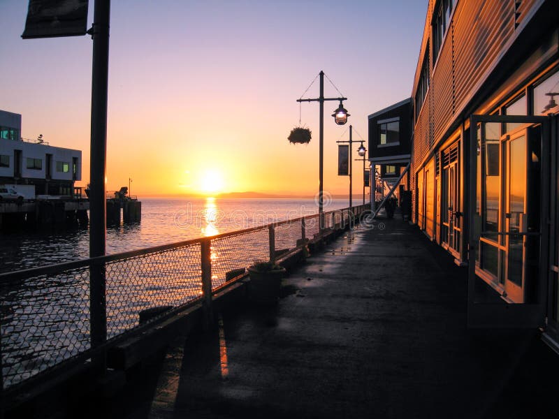 Sunset over Pier stock photo. Image of sunset, pacific - 33561638