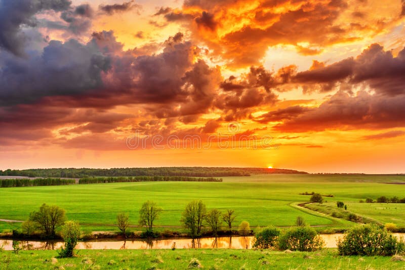 Sunset over a meadow stock image. Image of outdoor, countryside - 28000345