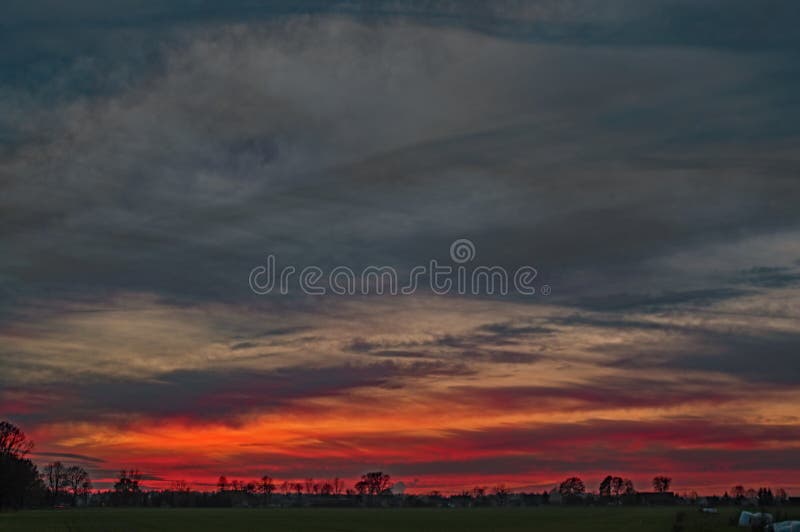 Sunset over the plain. stock photo. Image of land, young - 104024084