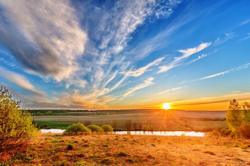Sunset on the plain stock image. Image of bright, lake - 40711231