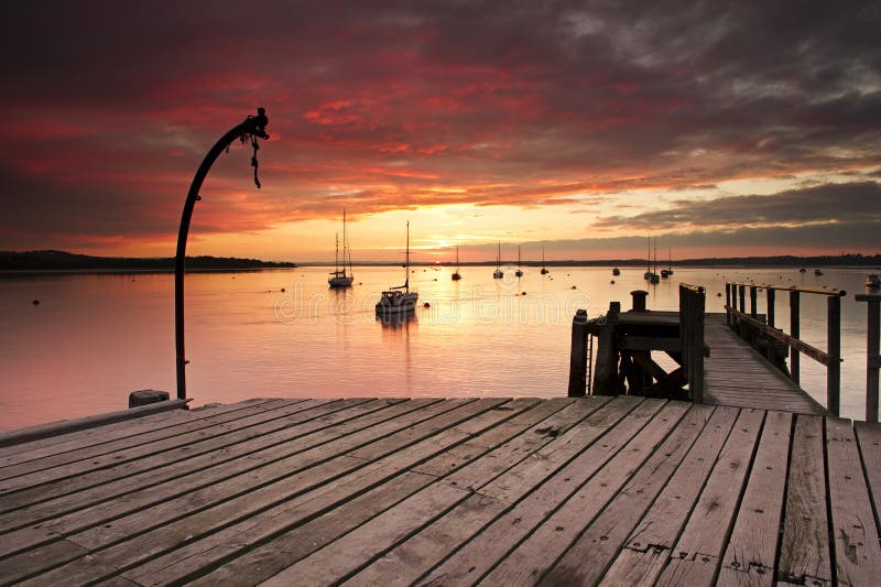 Sunset over Poole harbor stock photo. Image of outdoors - 21988568
