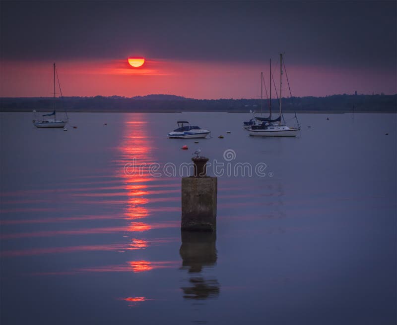 Sunset Over Poole Harbour at Hamworthy Pier Stock Photo - Image of ...