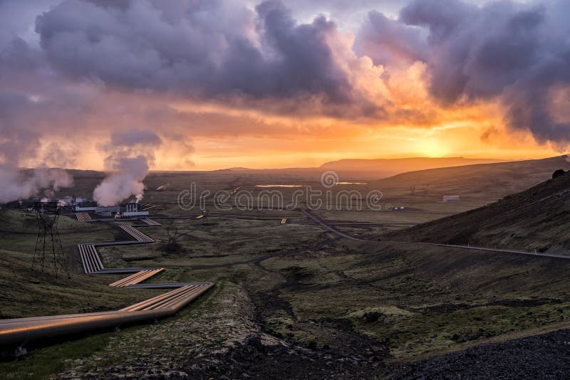 Dramatic Sunset Over a Green Power Plant Stock Photo - Image of ...