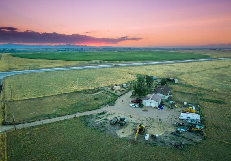 Sunset Over a Ranch stock image. Image of farm, acreage - 99634125