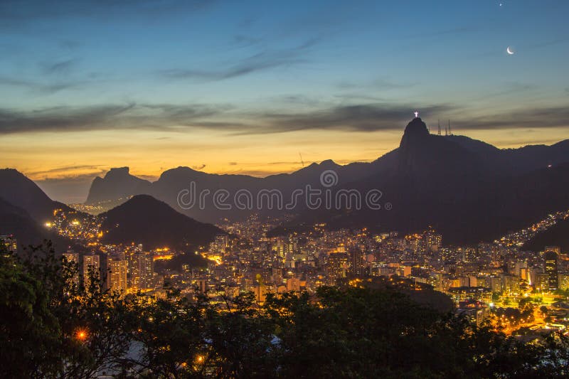 Sunset over Rio de Janeiro stock image. Image of stars - 65848995
