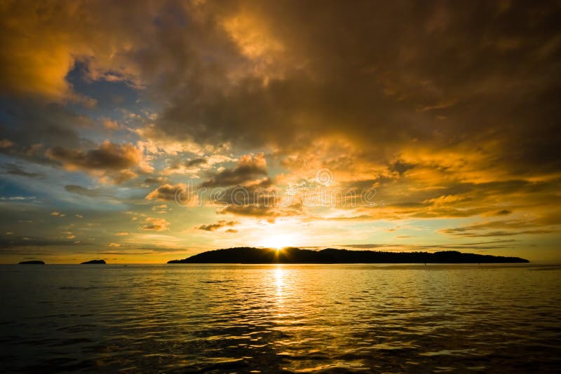 Colorful Sunset Over Rippled Water Stock Photo - Image of island ...