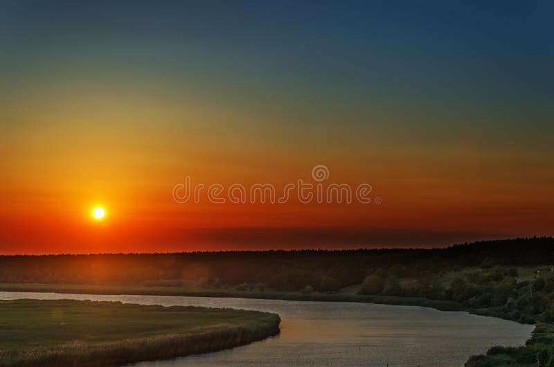 Sunset over river stock image. Image of cloudy, scenic - 27887917