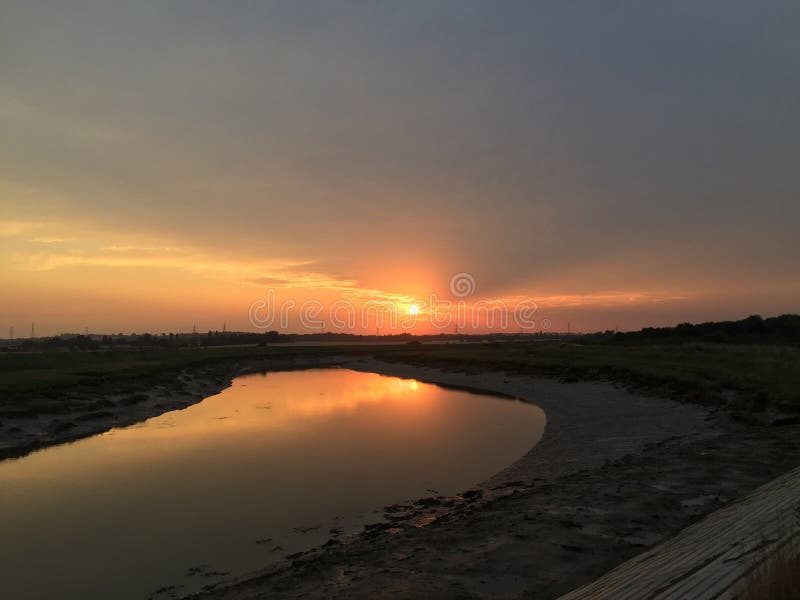 Sunset over river stock image. Image of sunset, river - 97258367