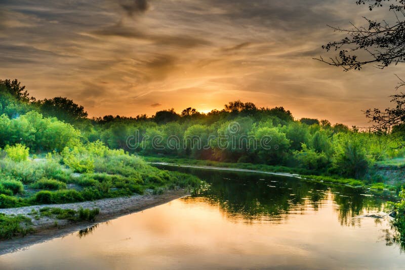 Sunset over river stock photo. Image of forest, nature - 97844784