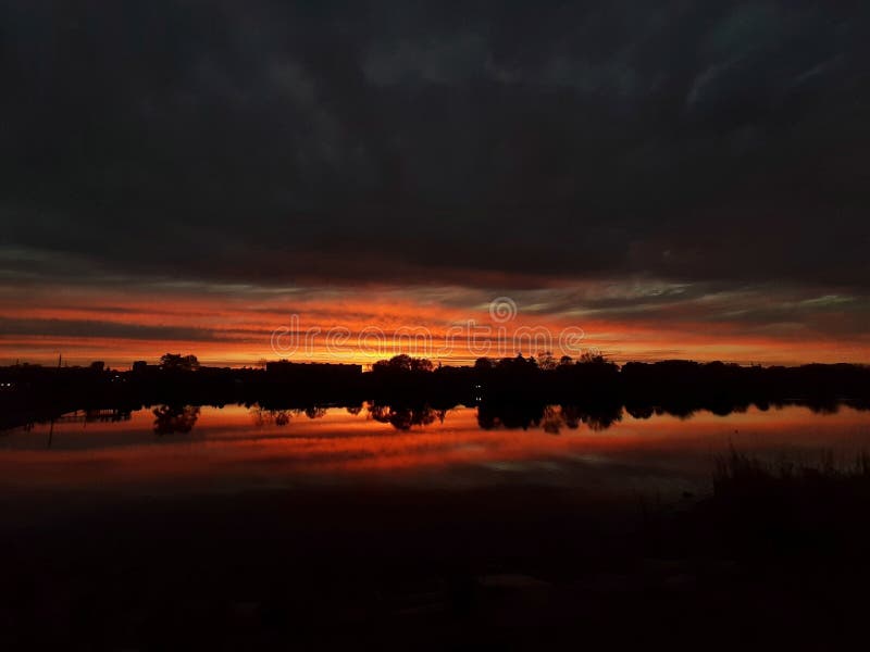 Sunset Over the River. the Sun is Beyond the Horizon. Sunset in the ...