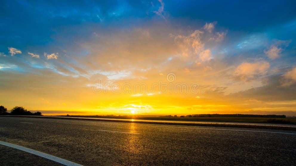 Sunset over road stock photo. Image of view, side, road - 76869388