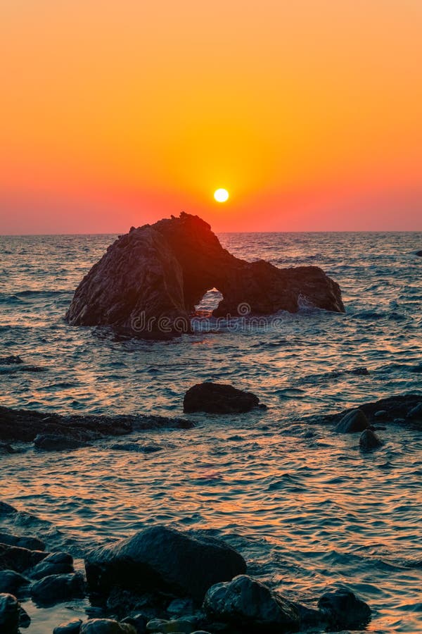 Sunset Over Rock Formation in Sfinari Beach, Crete, Greece Stock Image ...