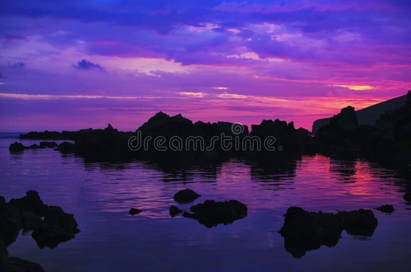 Sunset over rocks stock photo. Image of shoreline, country - 63566126