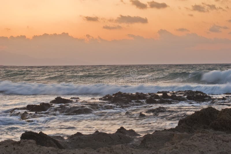 Sunset over rocky coast stock photo. Image of coast, picturesque - 14787110