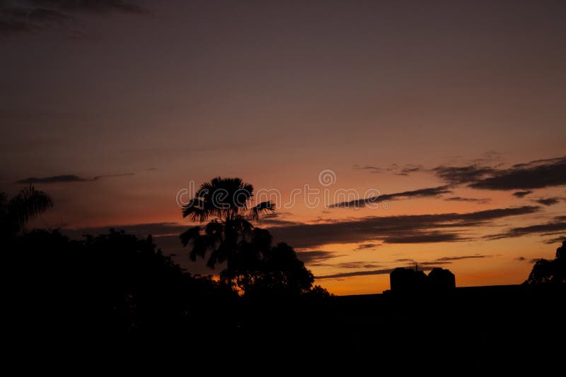 Sunset over the rooftops stock image. Image of heaven - 231316275