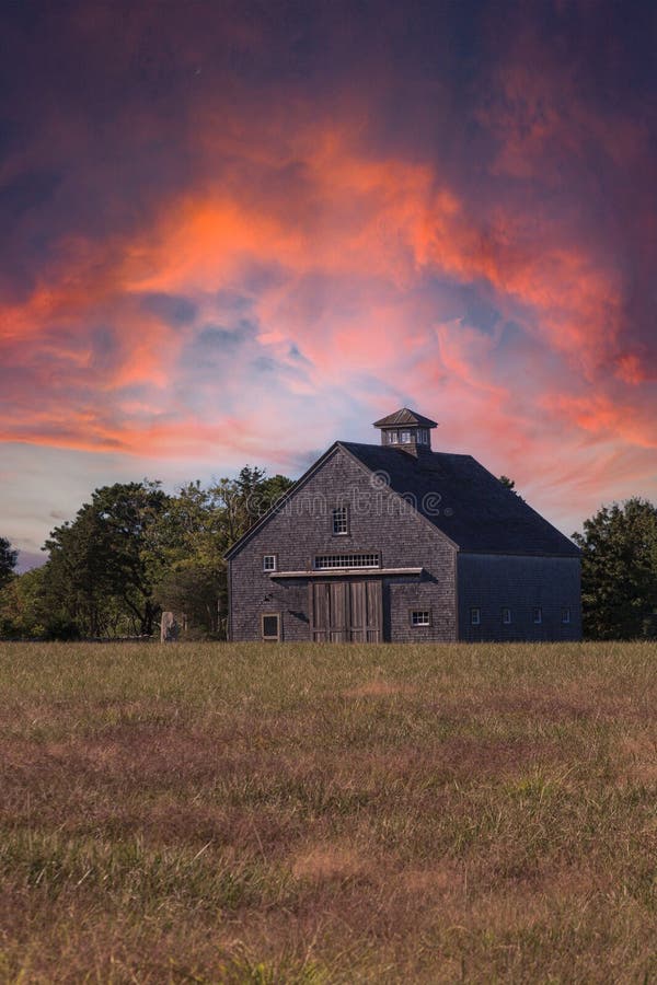 Sunset Over a Rustic Barn in a Field on Cape Cod Stock Photo - Image of ...