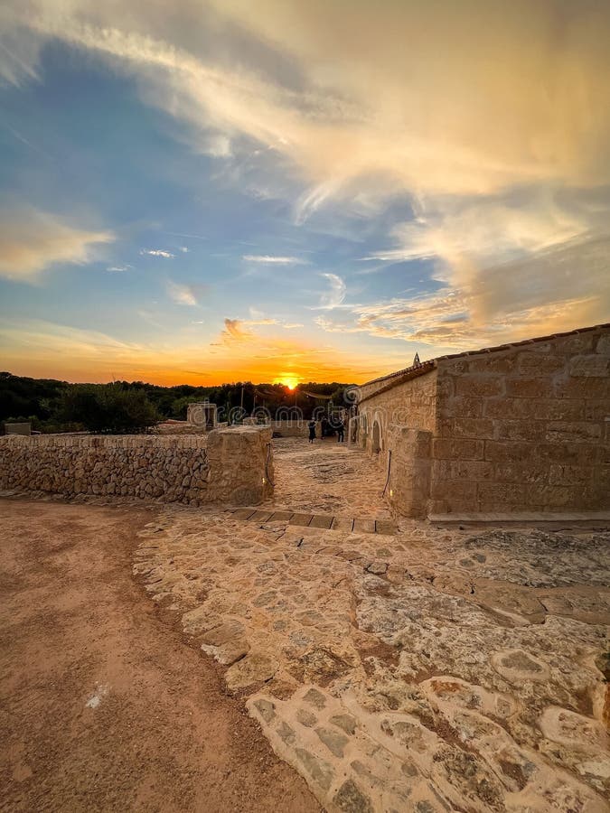 Sunset Over Rustic Stone Pathway Building Stock Photos - Free & Royalty ...