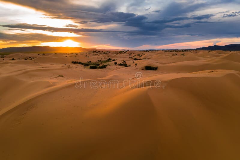 Sunset Over the Sand Dunes in the Desert Stock Photo - Image of ...