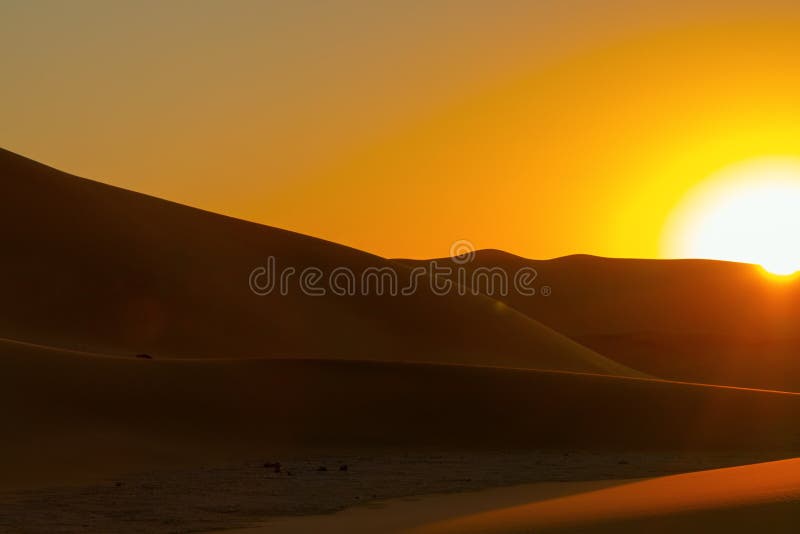 Sunset Over the Sand Dunes in the Desert. Stock Image - Image of ...