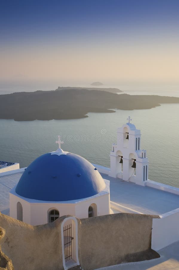 Sunset over Santorini stock photo. Image of dome, bells - 16052516