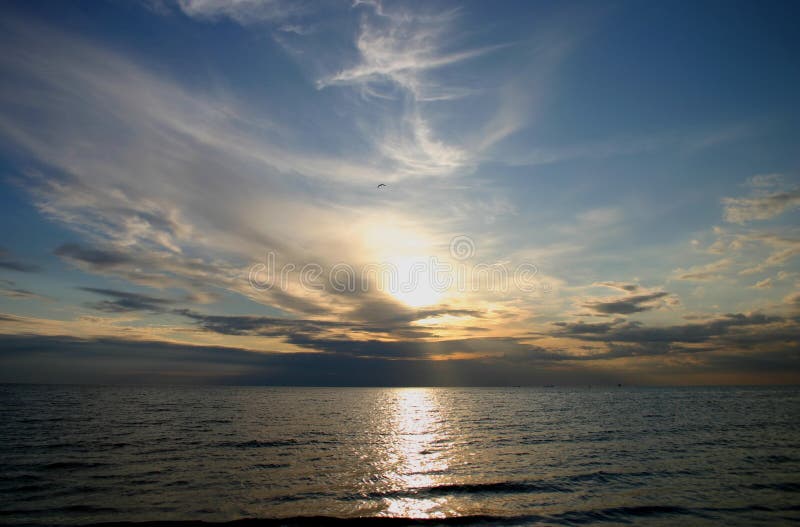 Sunset over sea stock photo. Image of yellow, water, reflection - 20690