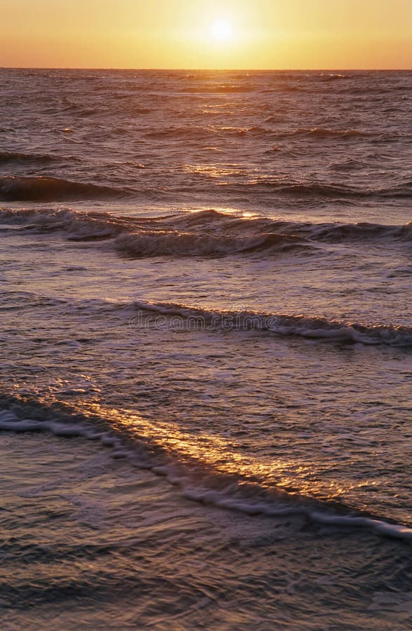 Sunset over sea stock image. Image of waves, outside, sunset - 995175
