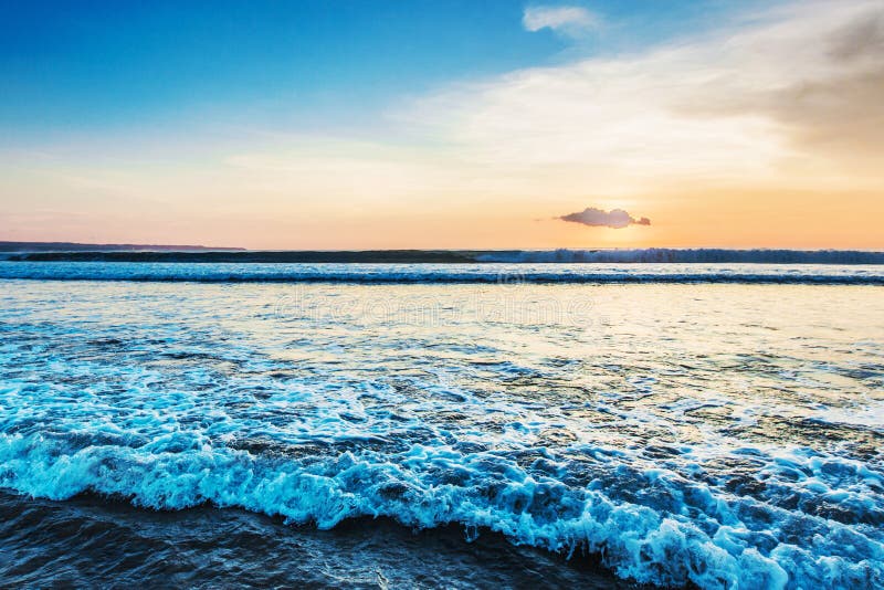 Sunset over sea on Bali stock image. Image of nature - 80537317