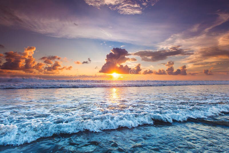 Sunset over sea on Bali stock image. Image of nature - 80537317