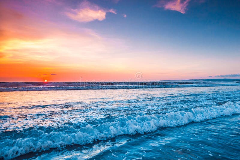 Sunset over sea on Bali stock image. Image of water, sunlight - 80468907