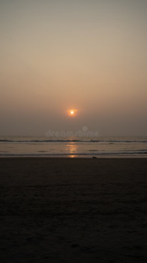 Sunset Over Sea and Beach. Cloudless Sundown Sky Over Waving Sea and ...