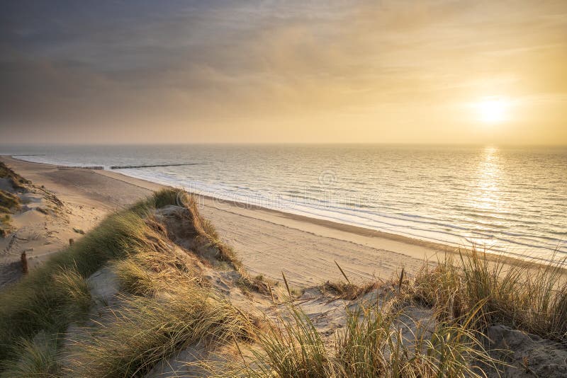 Sunset over sea beach stock image. Image of dutch, scenic - 266711413