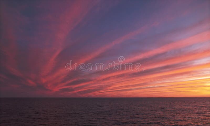 Sunset Over the Sea, Clear Separation Lines with Saturated Pink Color ...