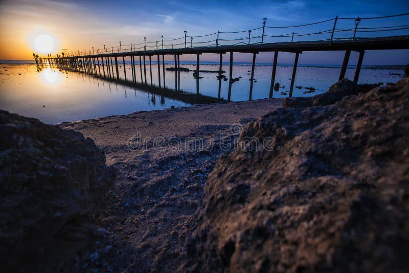 Sunset Over the Sea. Pier on the Foreground Stock Photo - Image of blue ...